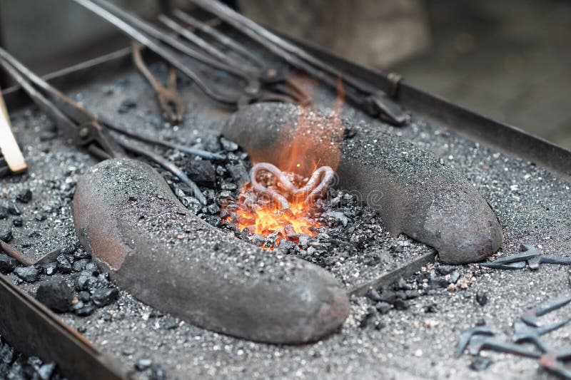 Blacksmith S Forge with Tools, Glowing Metal, and a Burning Flame in a ...