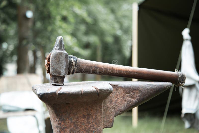 A Blacksmith S Hammer Lying on an Anvil . Outdoor Forge Stock Photo ...