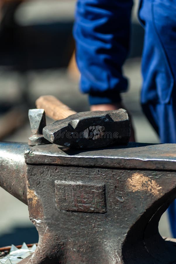 Blacksmith`s Hammer on a Metal Anvil in Forge Stock Image - Image of ...