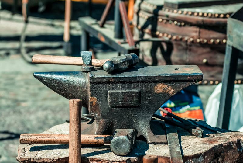 Blacksmith`s Hammer on a Metal Anvil in Forge Stock Image - Image of ...