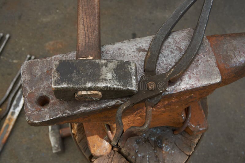 The Blacksmith`s Tools are an Anvil, a Hammer and Pincers Stock Photo ...