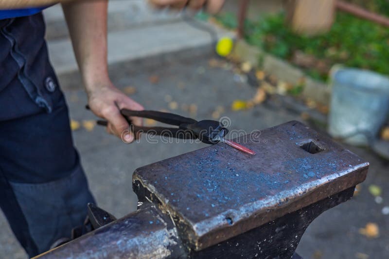 Blacksmith S Tools. Anvil, Pliers, Hammer, Fire, Iron Stock Photo ...