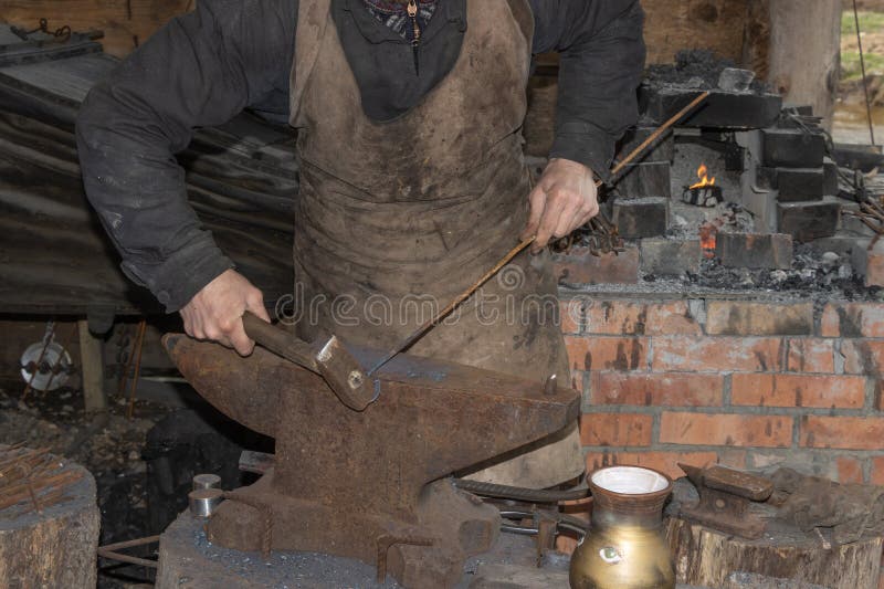 Blacksmith Works in the Forge with a Hammer Stock Image - Image of iron ...