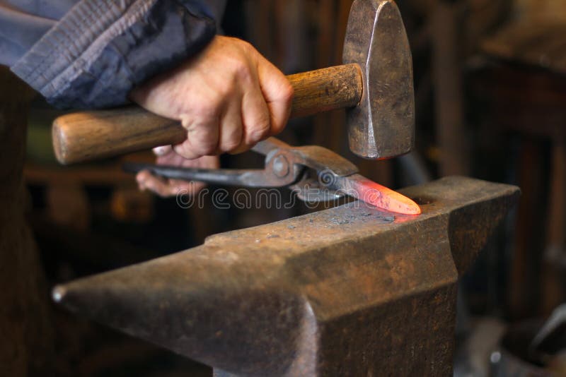 Blacksmith at work stock photo. Image of craft, fire - 18594006