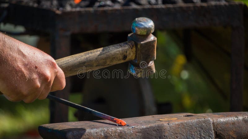Blacksmith at work stock image. Image of background - 106956983