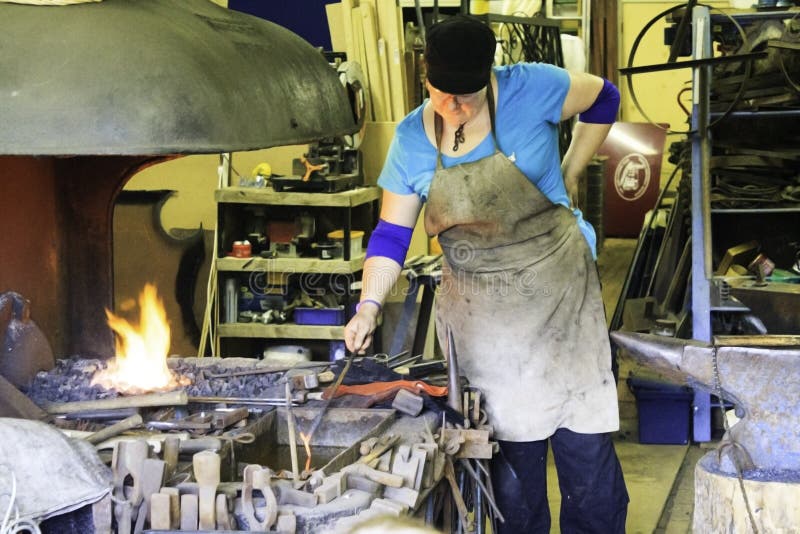 Blacksmith At Work In Anvil Stock Image - Image of hammer, occupation ...