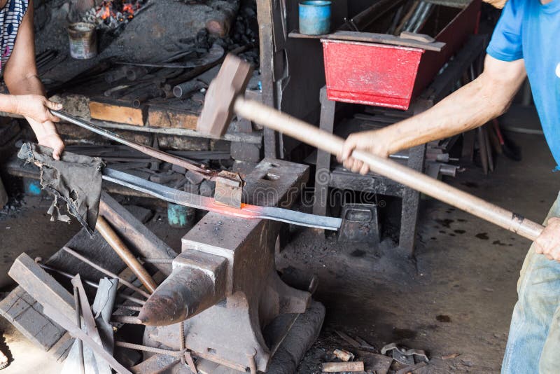 Blacksmith at Work in Small Workshop in Malaysia Stock Photo - Image of ...