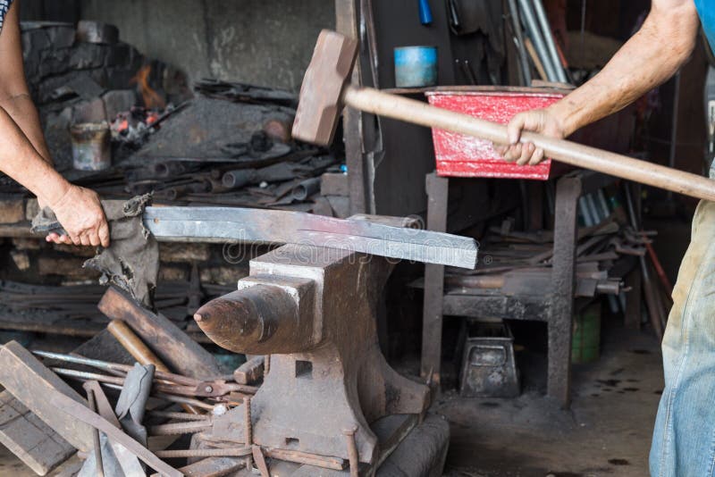 Blacksmith at Work in Small Workshop in Malaysia Stock Image - Image of ...