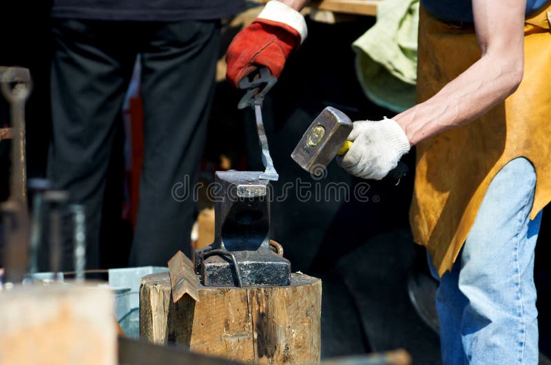 Blacksmith at work. stock image. Image of molten, steel - 31087791