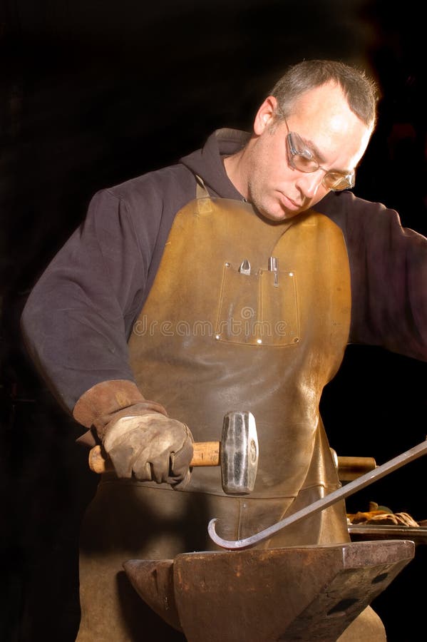 Blacksmith working stock photo. Image of blacksmith, sparks - 17068316