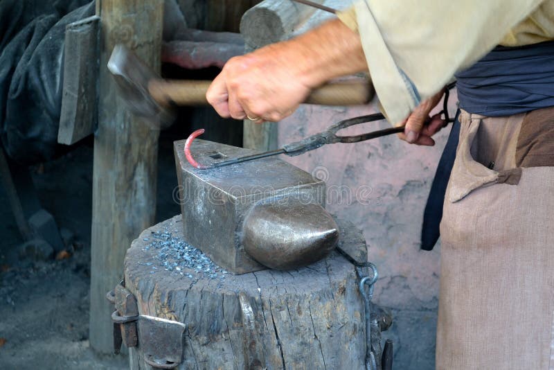 Blacksmith Working on Anvil Stock Photo - Image of shape, mission: 44894820