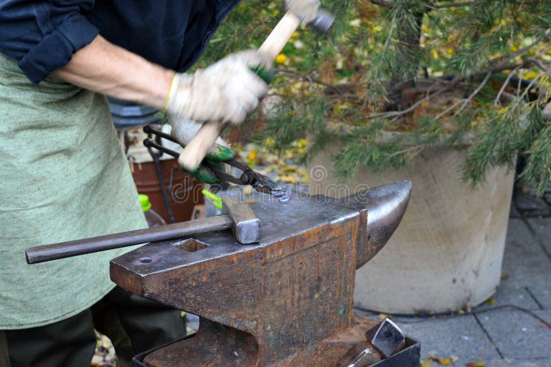 Blacksmith Working with Hammer and Anvil Stock Photo - Image of anvil ...