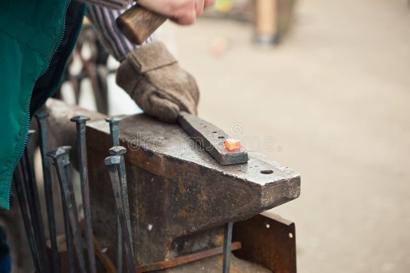 Blacksmith Working with Hammer and Iron Stock Photo - Image of smithing ...