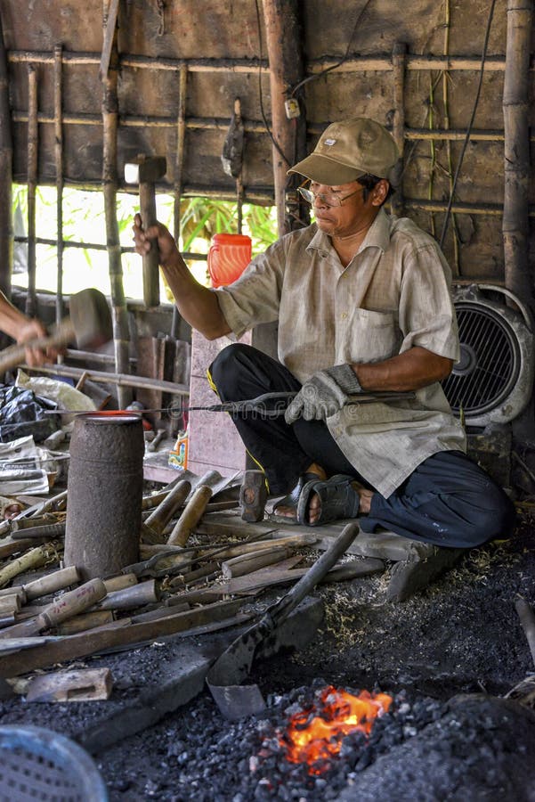 Blacksmith Working in His Smithy Editorial Photo - Image of central ...