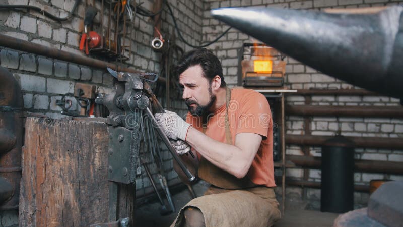 Blacksmith Working with Hot Metal at the Forge Stock Photo - Image of ...