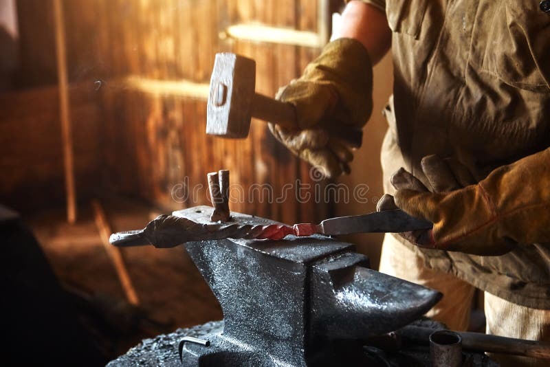 Blacksmith Working on Metal on Anvil at Forge High Speed Detail Stock ...