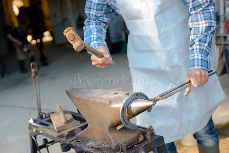 Blacksmith Working Metal with Hammer Stock Image - Image of heavy ...