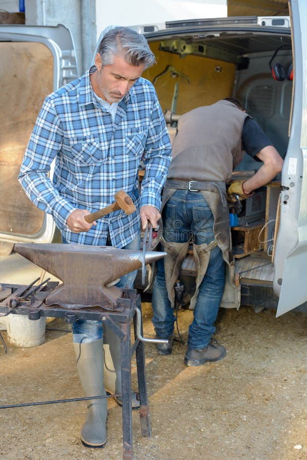 Blacksmith Working Outdoors Stock Photo - Image of metal, equipment ...