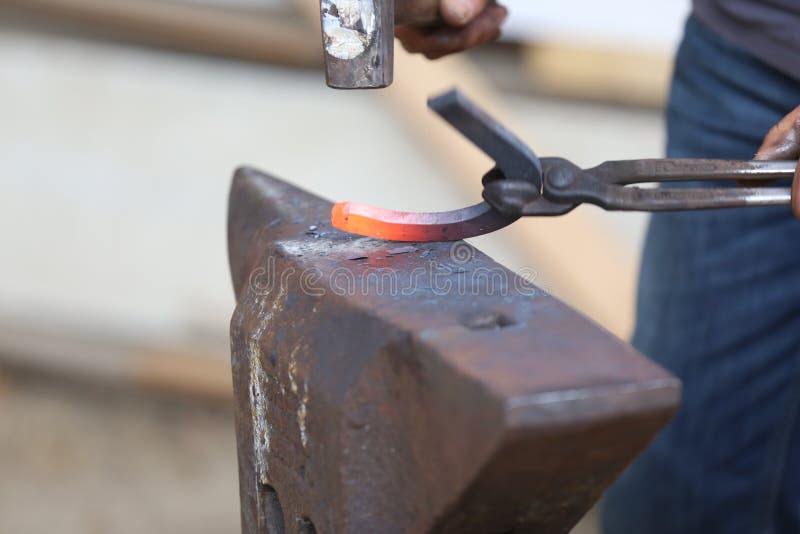 Blacksmith Working at Smithy Workshop Stock Image - Image of furnace ...