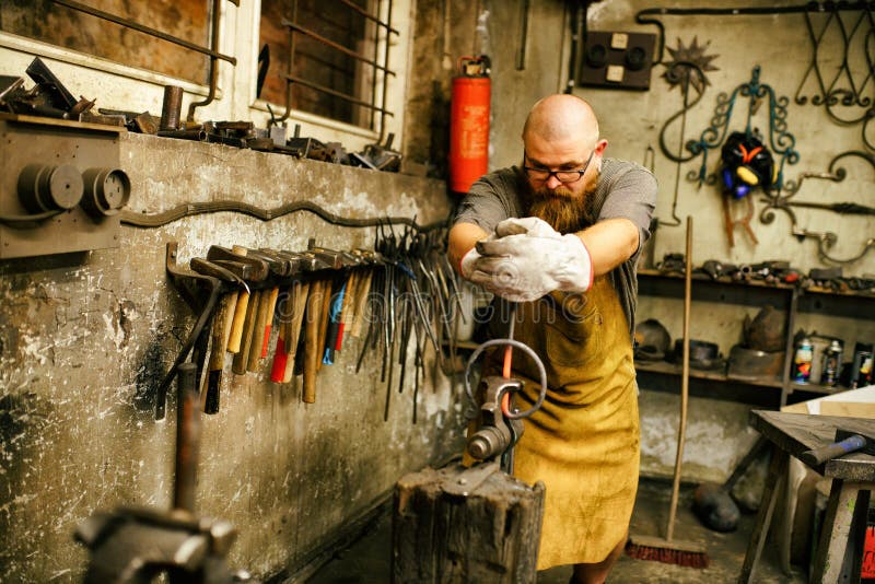 Blacksmith Working in Workshop Stock Image - Image of forge, bright ...
