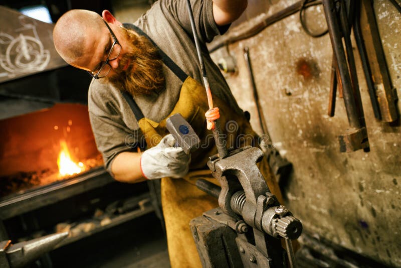 Blacksmith Working in Workshop Stock Photo - Image of hand, bright ...