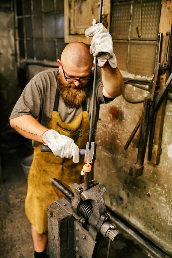 Blacksmith Working in Workshop Stock Image - Image of metalwork, hammer ...