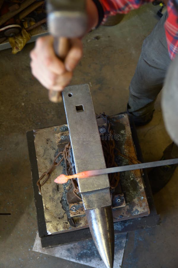 Blacksmith in His Home Workshop Making Tools Stock Image - Image of ...