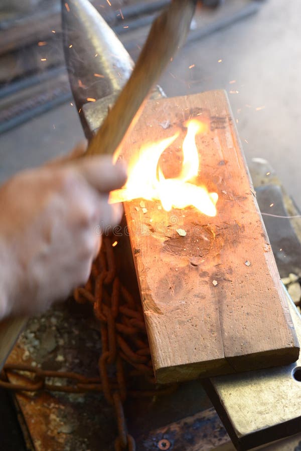 Blacksmith in His Home Workshop Making Tools Stock Image - Image of ...
