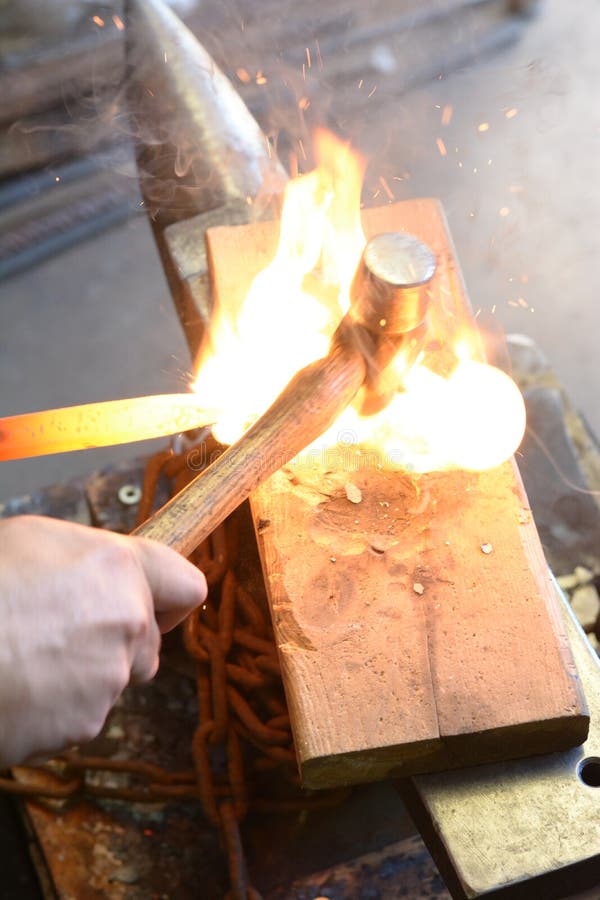 Blacksmith in His Home Workshop Making Tools Stock Photo - Image of ...