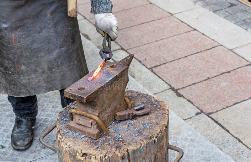 Blacksmith Works with Red-hot Metal on the Anvil Stock Photo - Image of ...