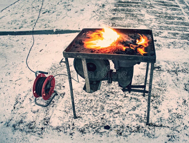 Blacksmiths Tool. Old Blacksmiths Hand Oven. Heating of Metal by the ...