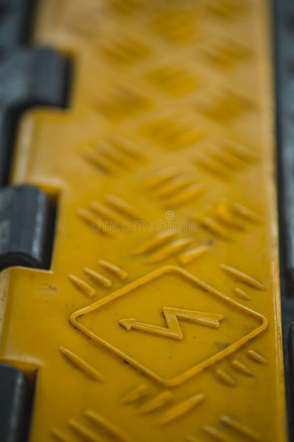 Blacl and Yellow Plastic Cable Protector Cover Stock Photo - Image of ...