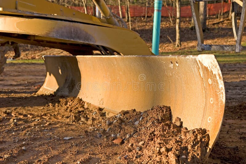 Blade in Dirt stock photo. Image of grading, environment - 4250914