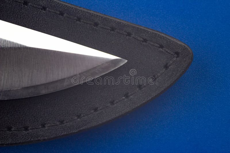 The Blade of a Knife on a Blue Background Stock Image - Image of ...