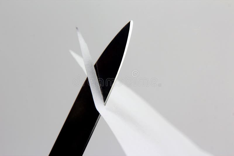 Blade of a Sharp Knife Cut Across the White Paper Stock Image - Image ...