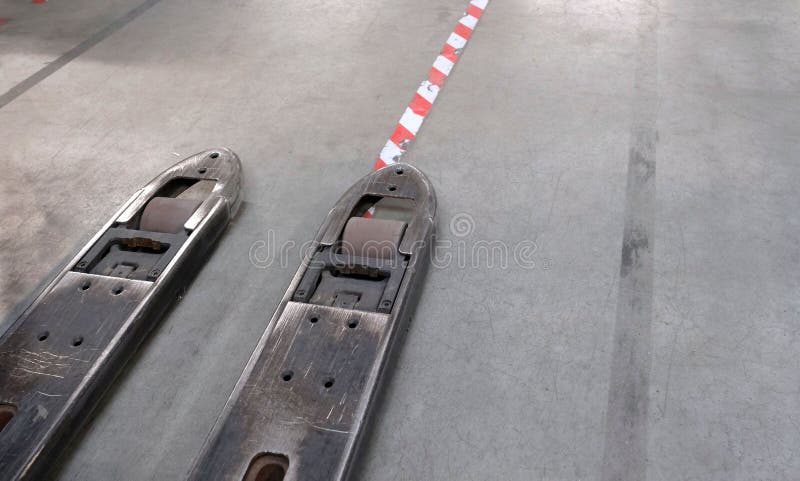 Blades of a Pallet Jack - Package Lifter Stock Photo - Image of white ...