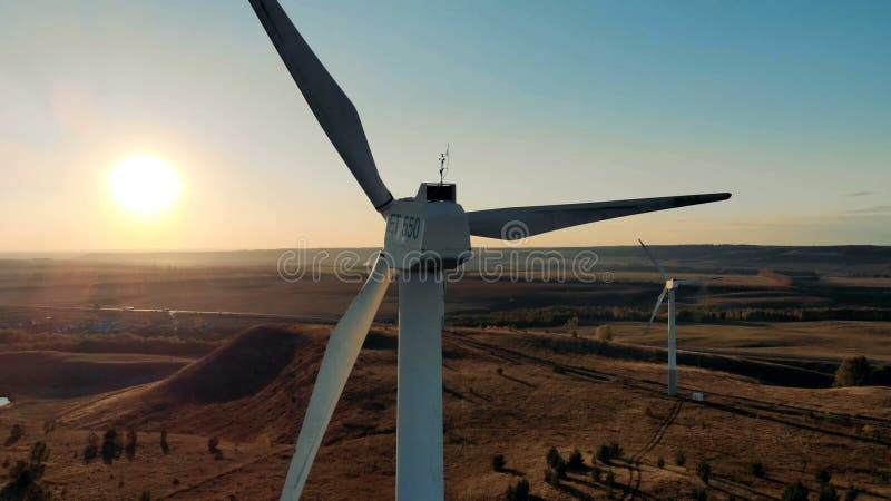 Blades of a Windmill Rotating in the Sunlight. Eco-friendly Energy ...