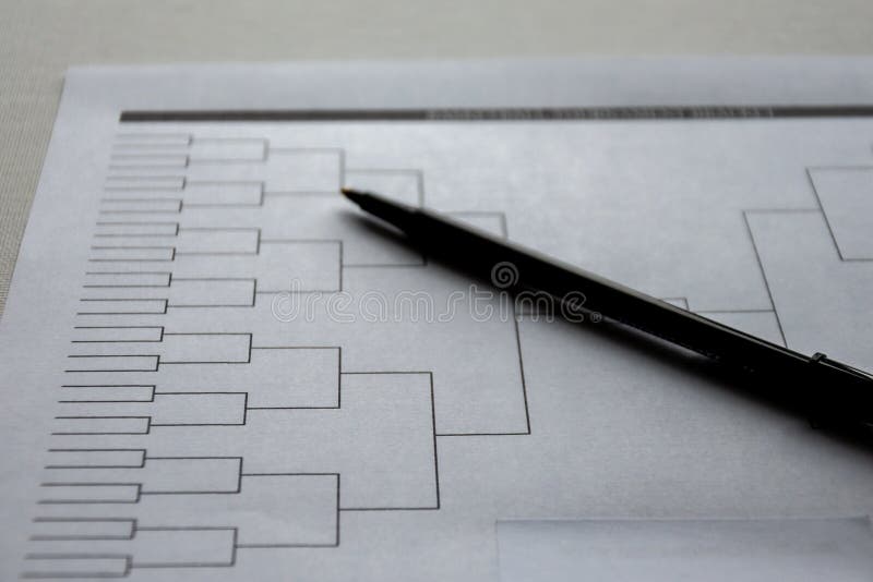Blank Basketball Bracket Grid on White Paper with Pen Laying on Top ...