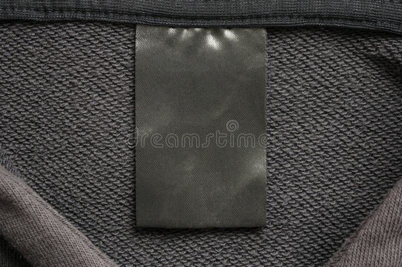 Blank Black Laundry Care Clothes Label on Black Fabric Texture ...
