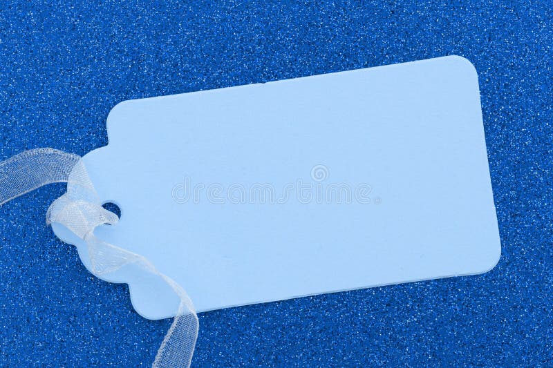 Blank Blue Gift Tag on Glitter Paper Stock Image - Image of present ...