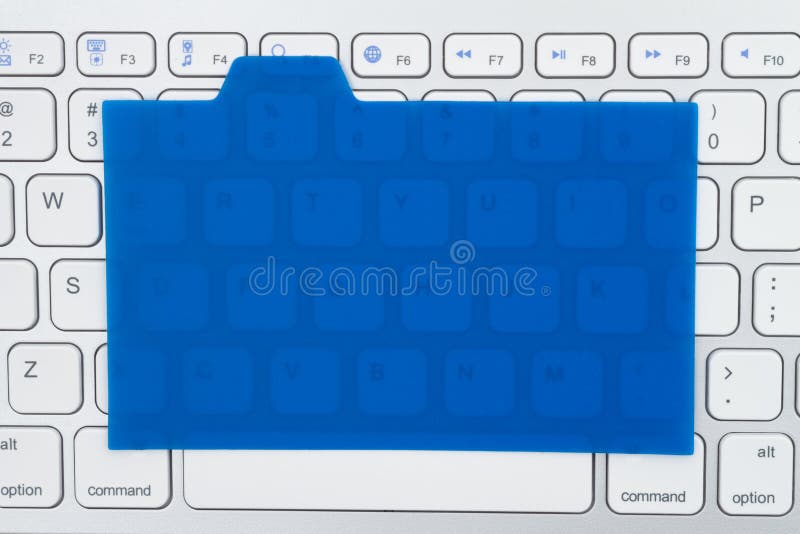 Blank Blue Sticky Note on a Profile Gray Computer Keyboard Stock Image ...