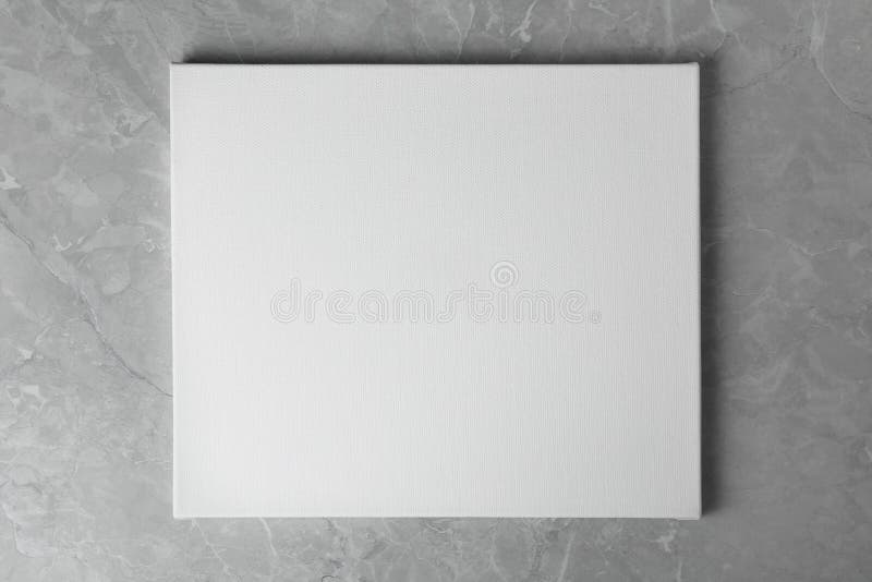 Blank Canvas on Grey Marble Table, Top View. Space for Text Stock Image ...