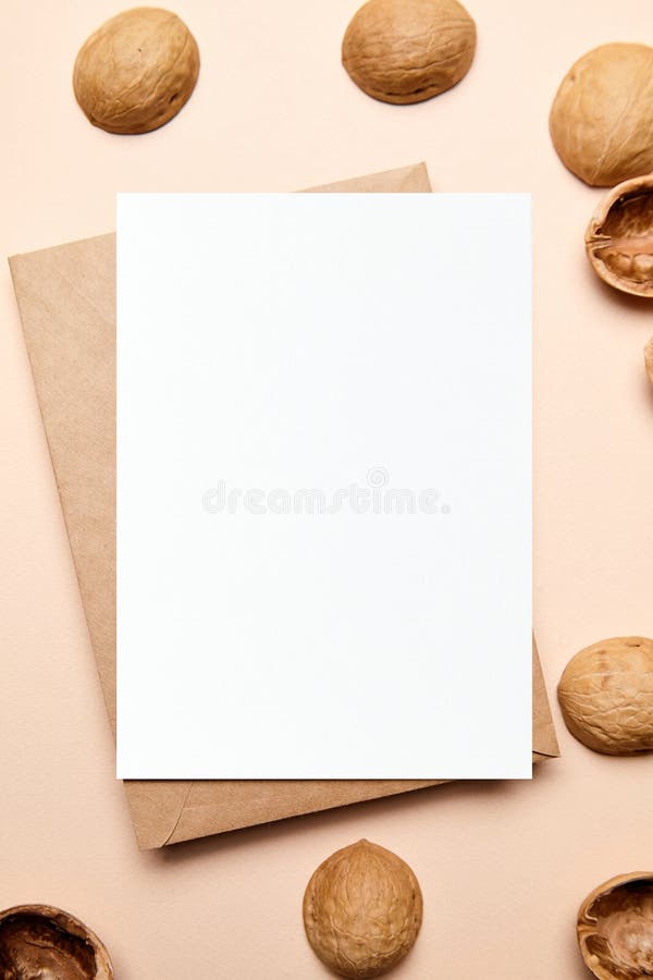 Blank Card Mockup with Walnut Shells and Envelop on Beige Background ...