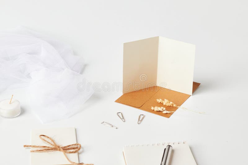 Simple Stationery Setup with Blank Card, Paper Clips, and Decorative ...