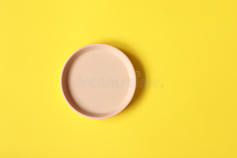 Clay Plate on Yellow Background Stock Image - Image of utensil, dinner ...