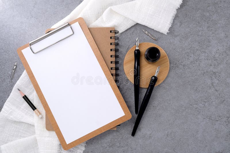 Blank Clipboard with Dip Pen on Stone Texture Background. Writer ...