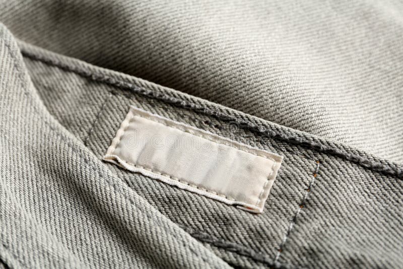 Blank Clothing Label on Grey Jeans, Closeup Stock Image - Image of ...