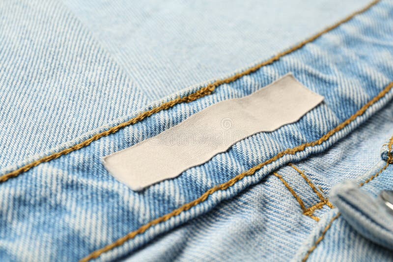 Blank Clothing Label on Light Blue Jeans, Closeup Stock Image - Image ...