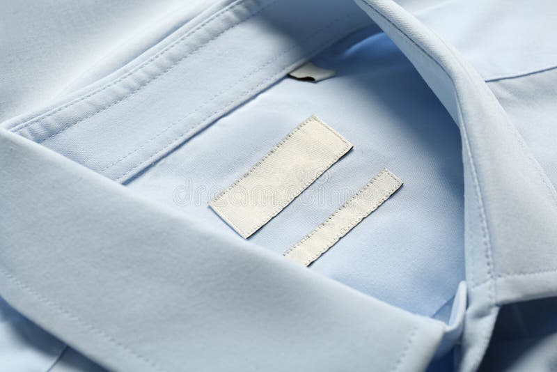 Blank Clothing Labels on Light Blue Shirt, Closeup Stock Photo - Image ...