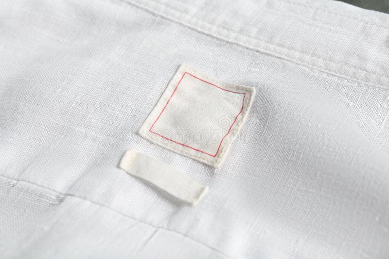 Blank Clothing Labels on White Shirt, Closeup Stock Photo - Image of ...
